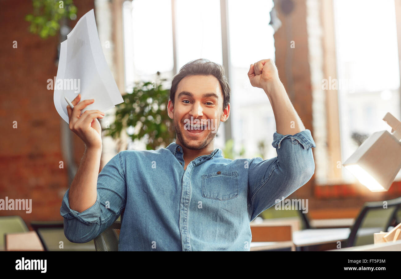 Cheerful man expressing jubilation Stock Photo - Alamy