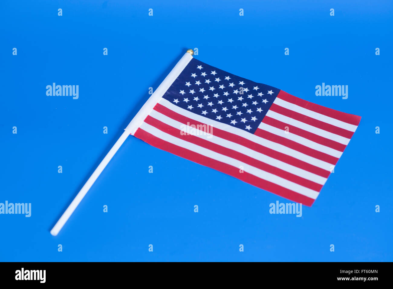 American flag on blue background Stock Photo - Alamy