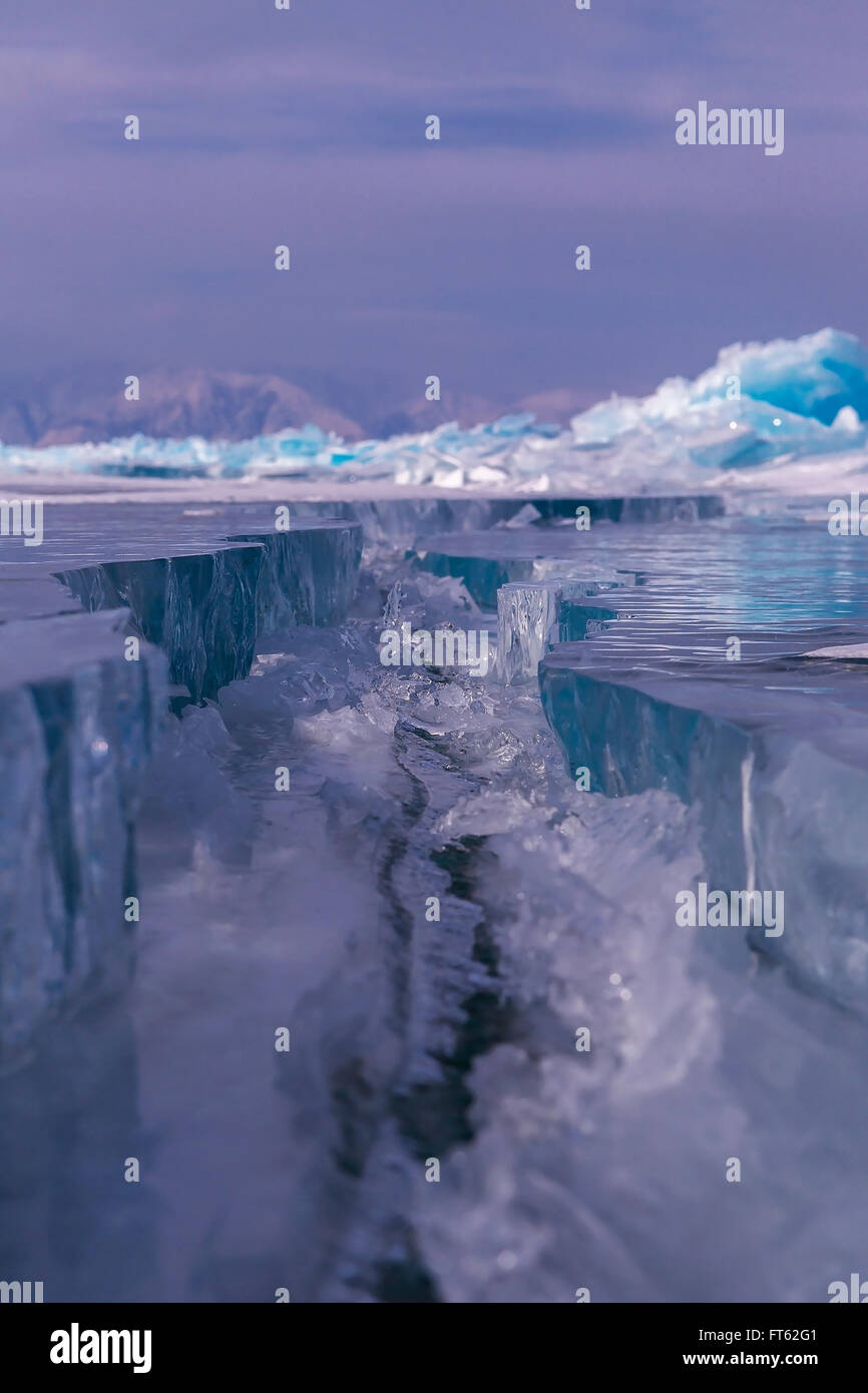 Large cracks on surface of the ice Stock Photo - Alamy