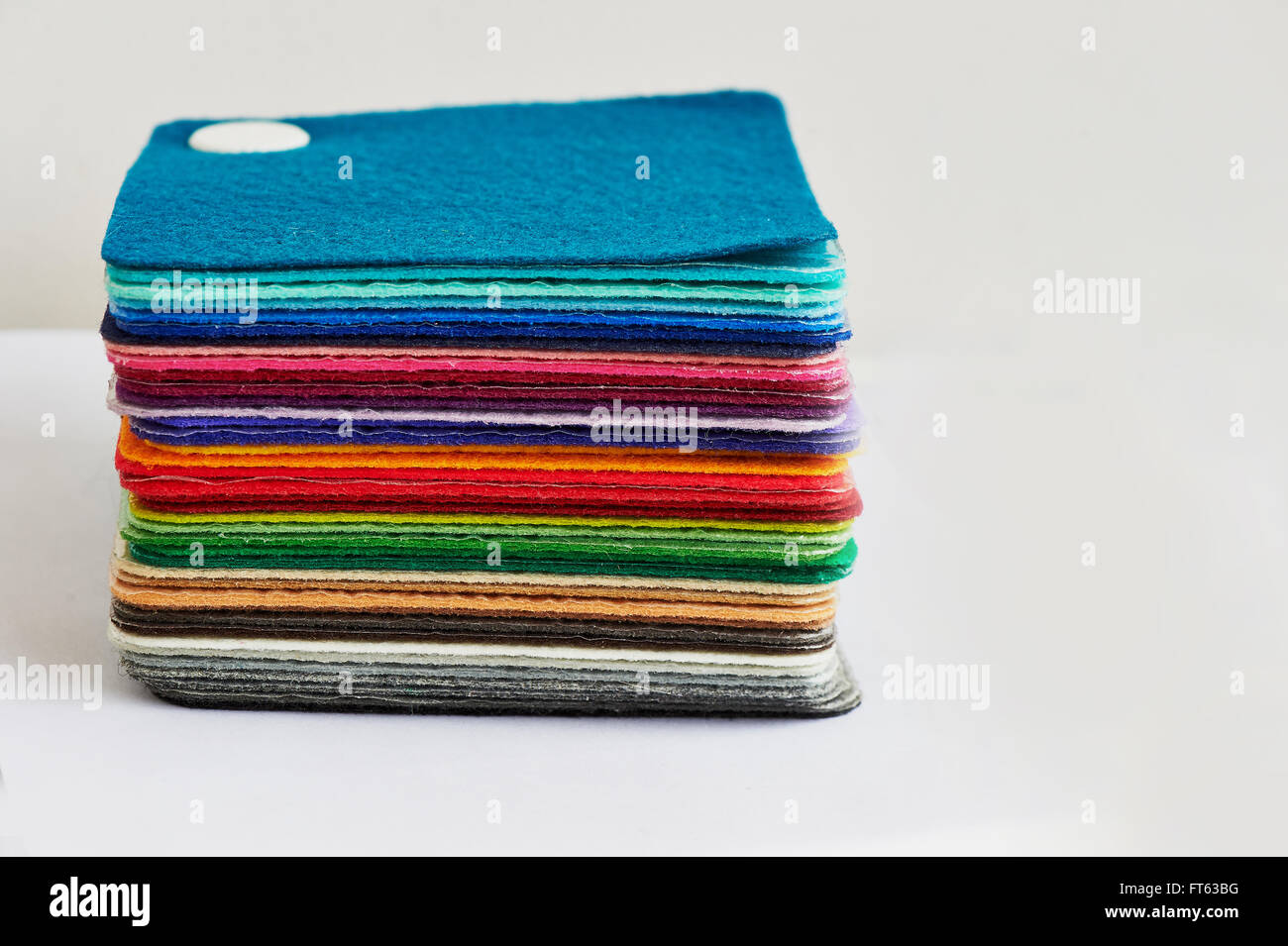 Felt fabric sheets in various colors piled up in a stack Stock Photo ...