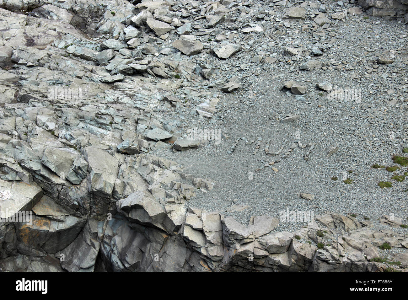 Porthgain slate quarry and artwork of rocks made by tourists Stock ...