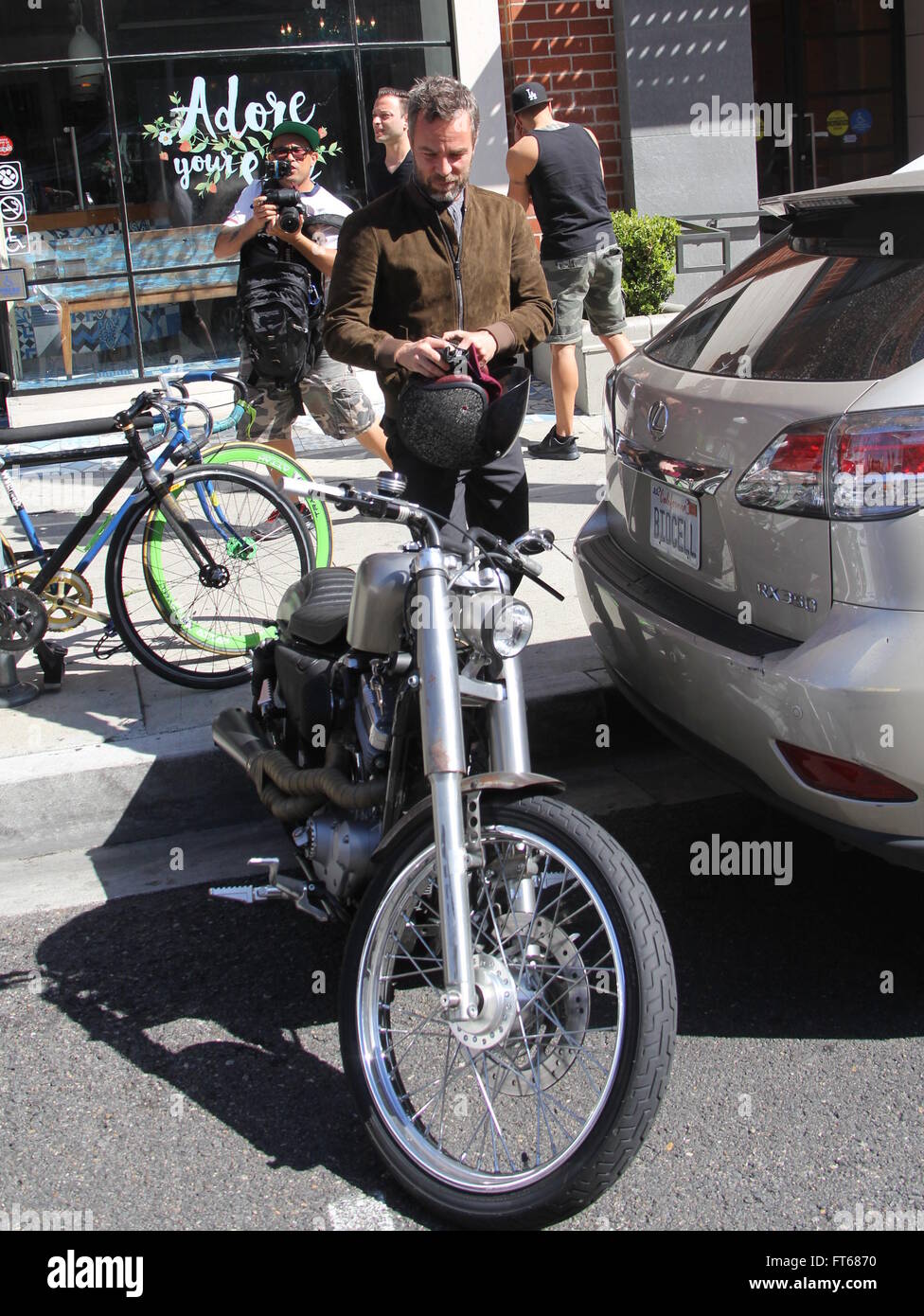 Canadian actor J. R. Bourne out on his motorbike in Beverly Hills ...