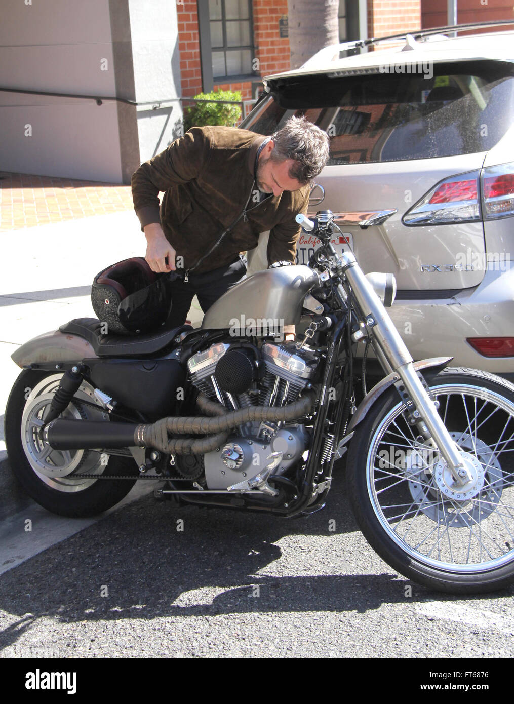 Canadian actor J. R. Bourne out on his motorbike in Beverly Hills ...
