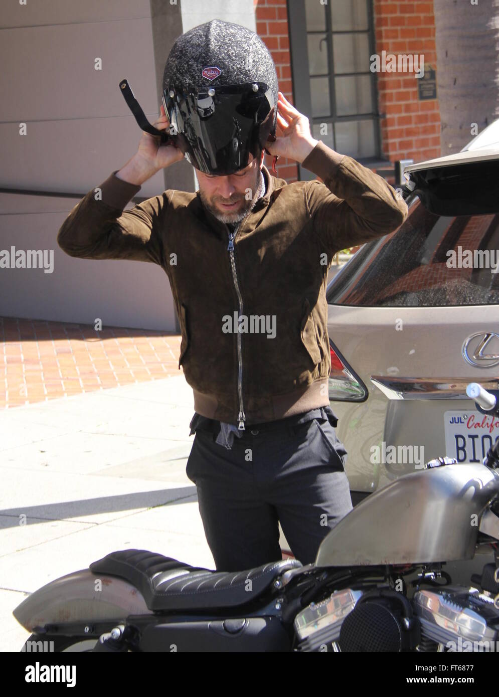Canadian actor J. R. Bourne out on his motorbike in Beverly Hills ...