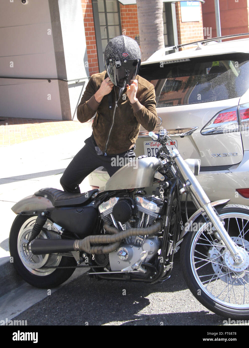 Canadian actor J. R. Bourne out on his motorbike in Beverly Hills ...
