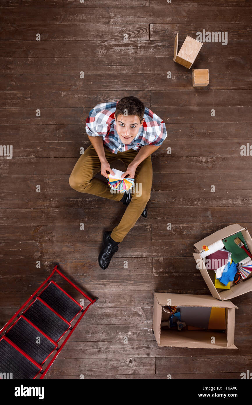 Top view photo of man on wooden floor Stock Photo - Alamy