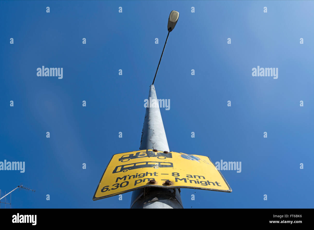 british road sign indicating waiting and weight restrictions for parked ...