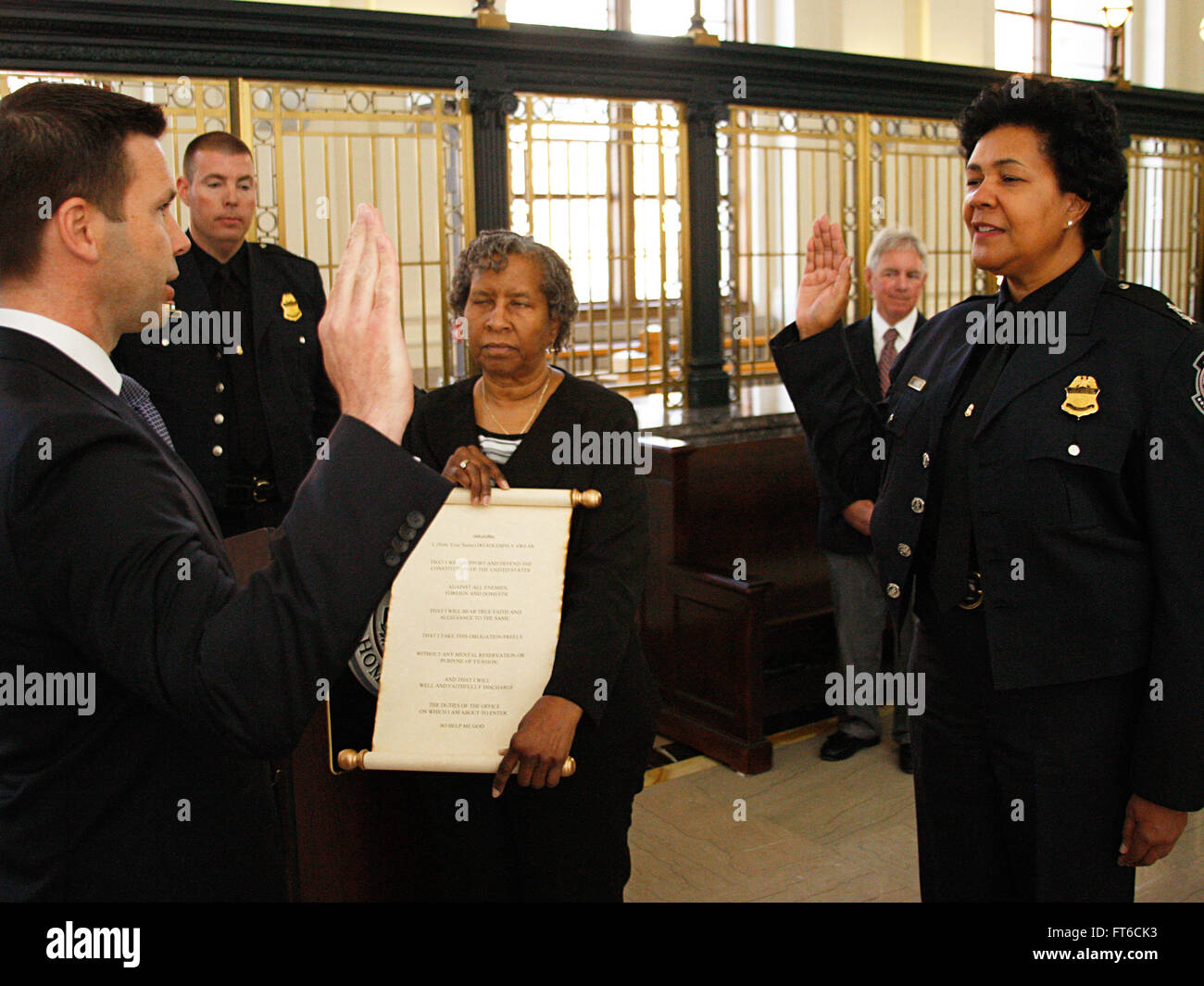 The swearing-in ceremony of Augustine Moore as the new Director of ...