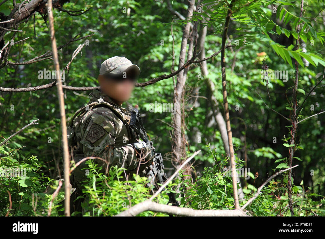 This image shows a BORTAC team on patrol, part of a manhunt for ...