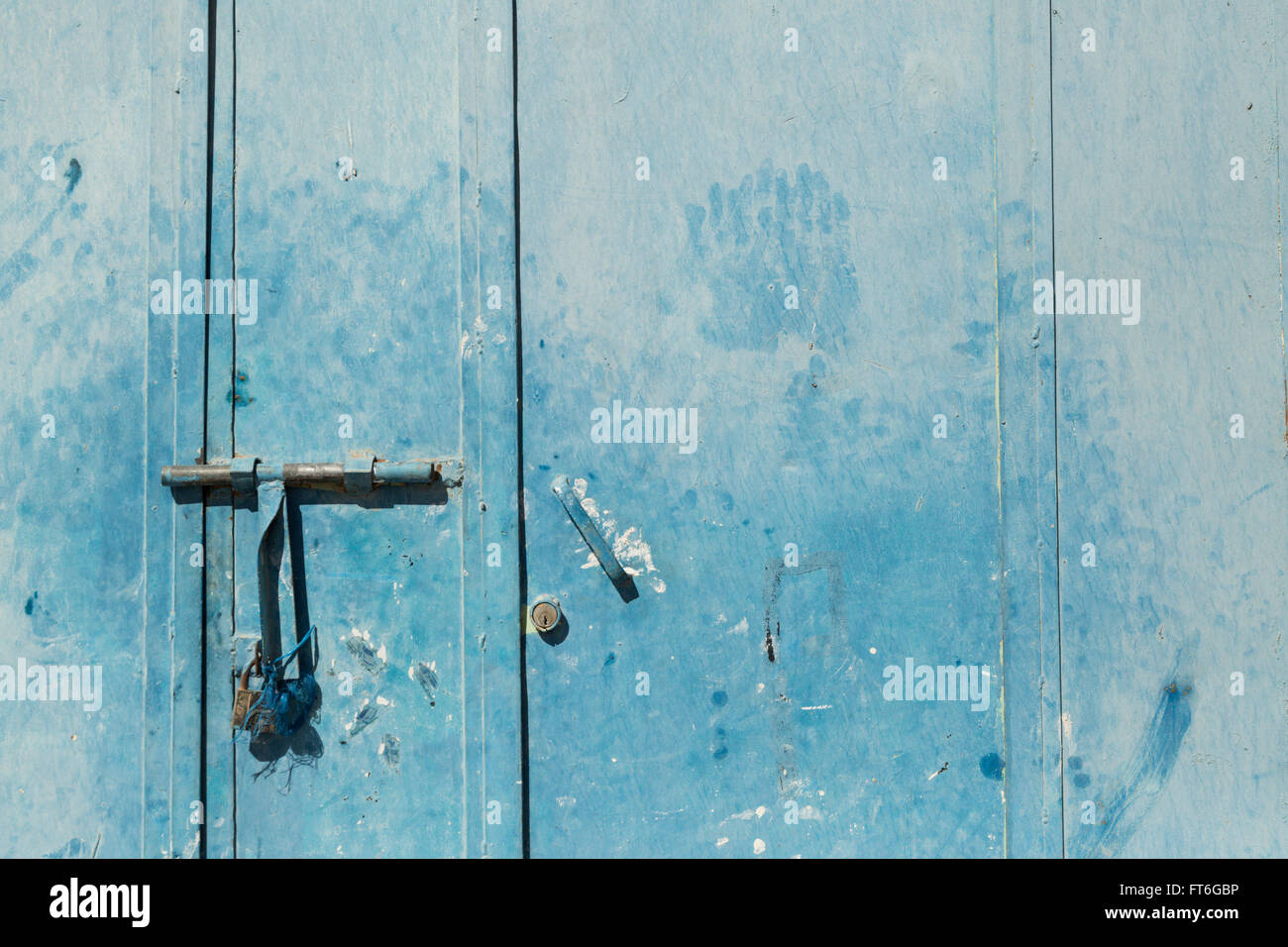 blue metal door with dusty hand prints Stock Photo - Alamy