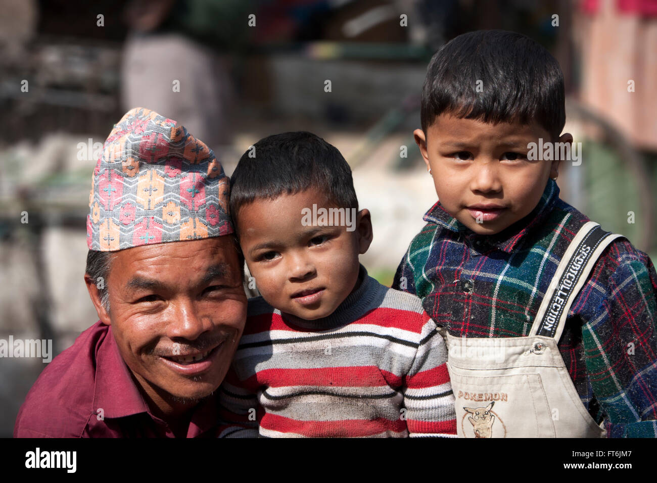 Nepal, Kathmandu. Father and Two Sons Stock Photo - Alamy
