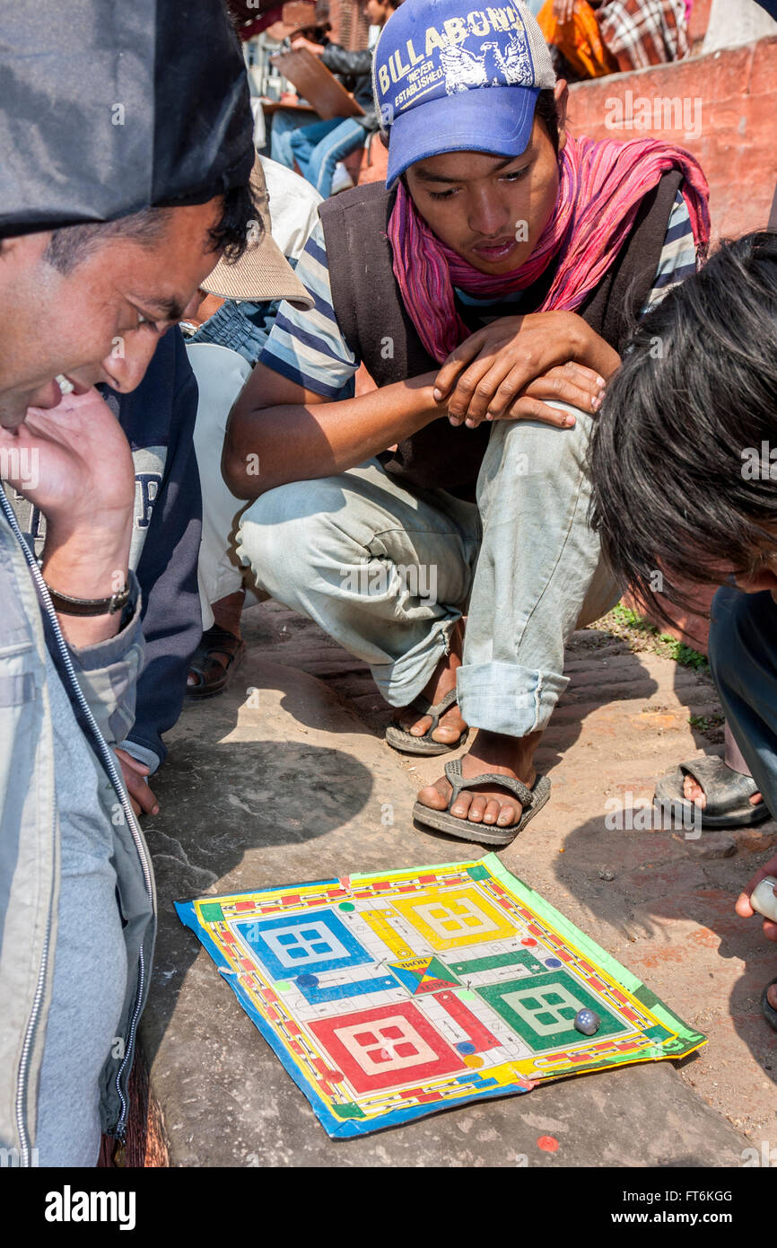 Nepal, Kathmandu. Young Men Playing Parchesi in Durbar Square Stock ...