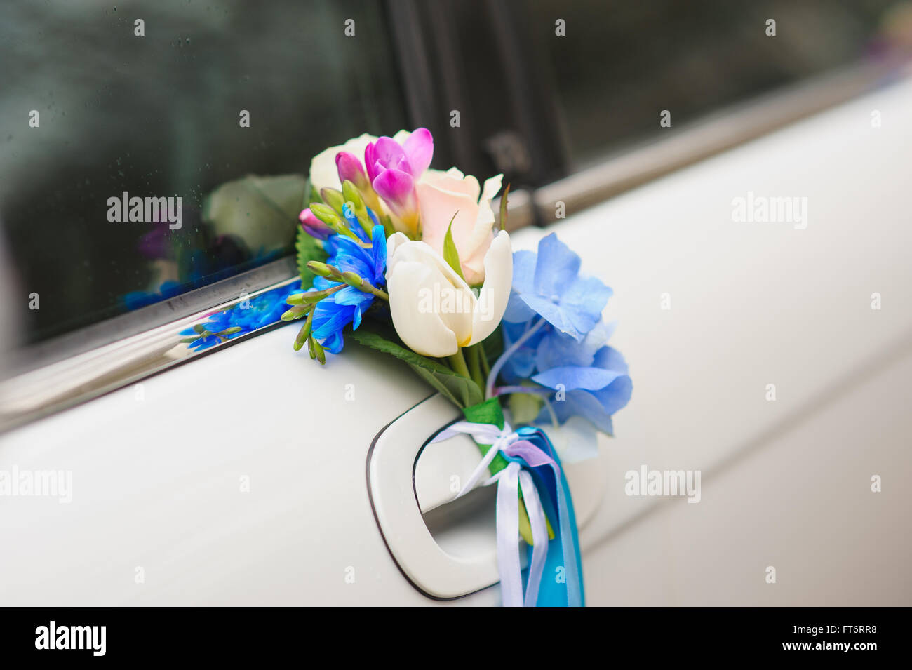 Floral arrangement on car handle Stock Photo - Alamy