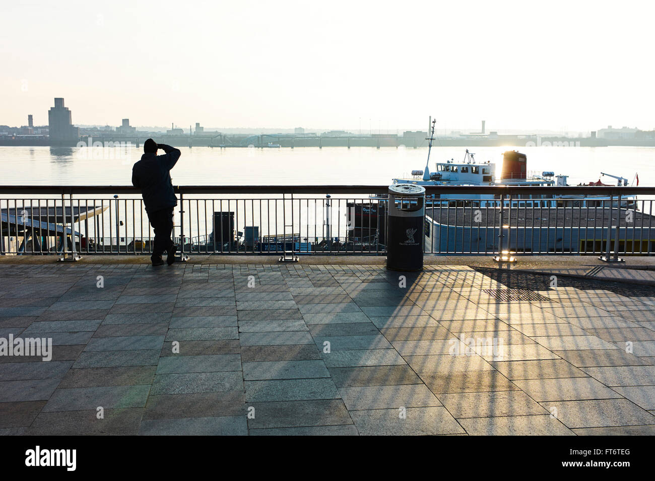 Silhouette man leaning on railings hi-res stock photography and images ...