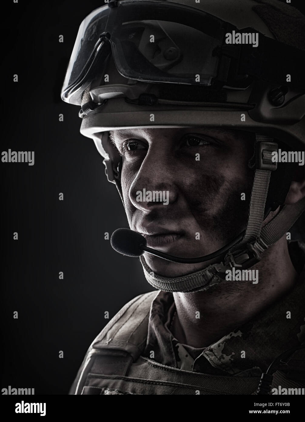 Young handsome military man in italian camouflage wearing helmet ...