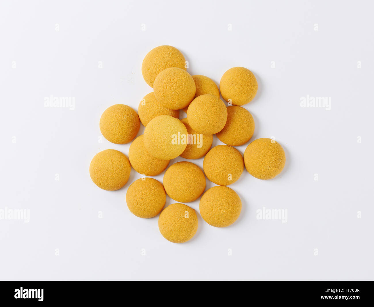 heap of small round sponge biscuits Stock Photo - Alamy