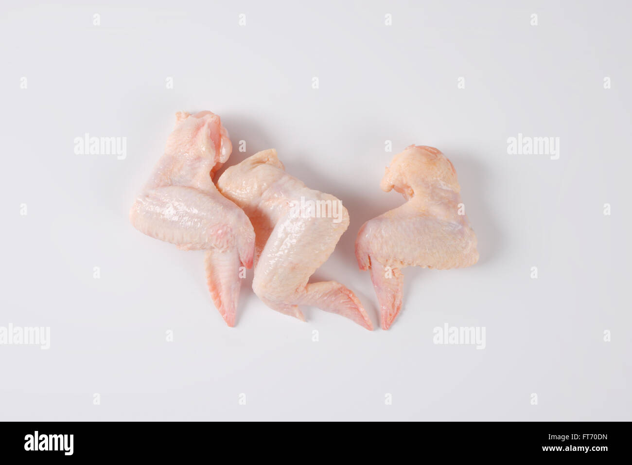 raw chicken wings, skin-on Stock Photo - Alamy