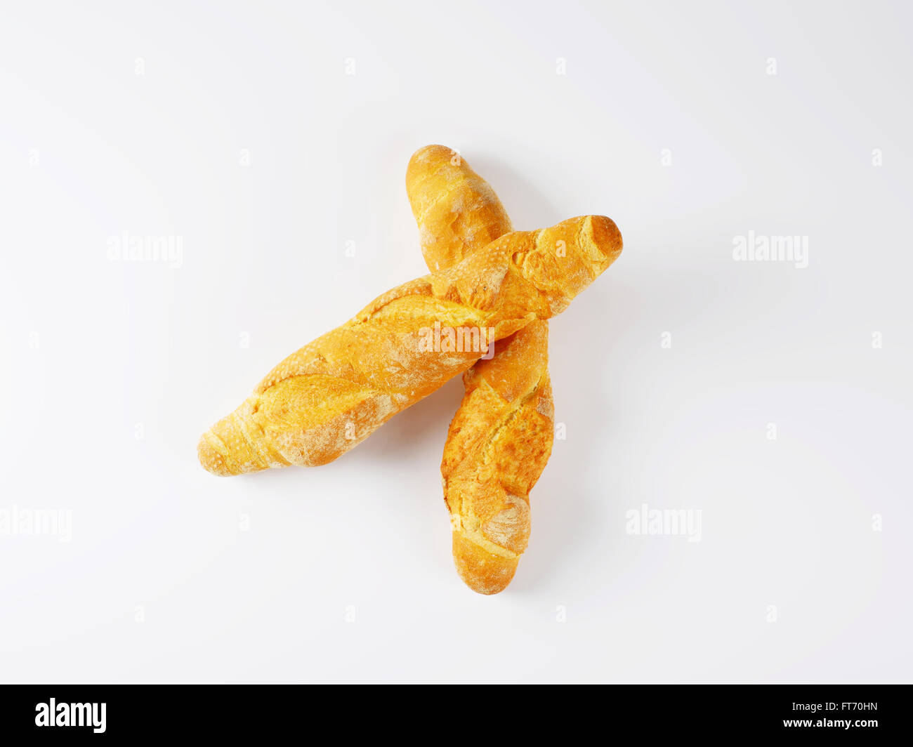 two long thin loaves of French bread Stock Photo - Alamy