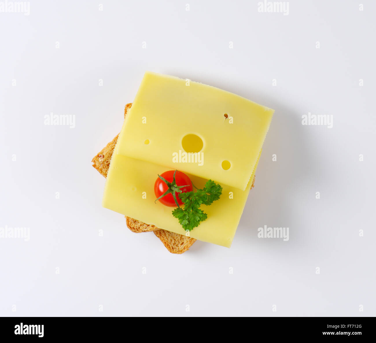 slices of whole grain bread with emmenthaler cheese Stock Photo - Alamy