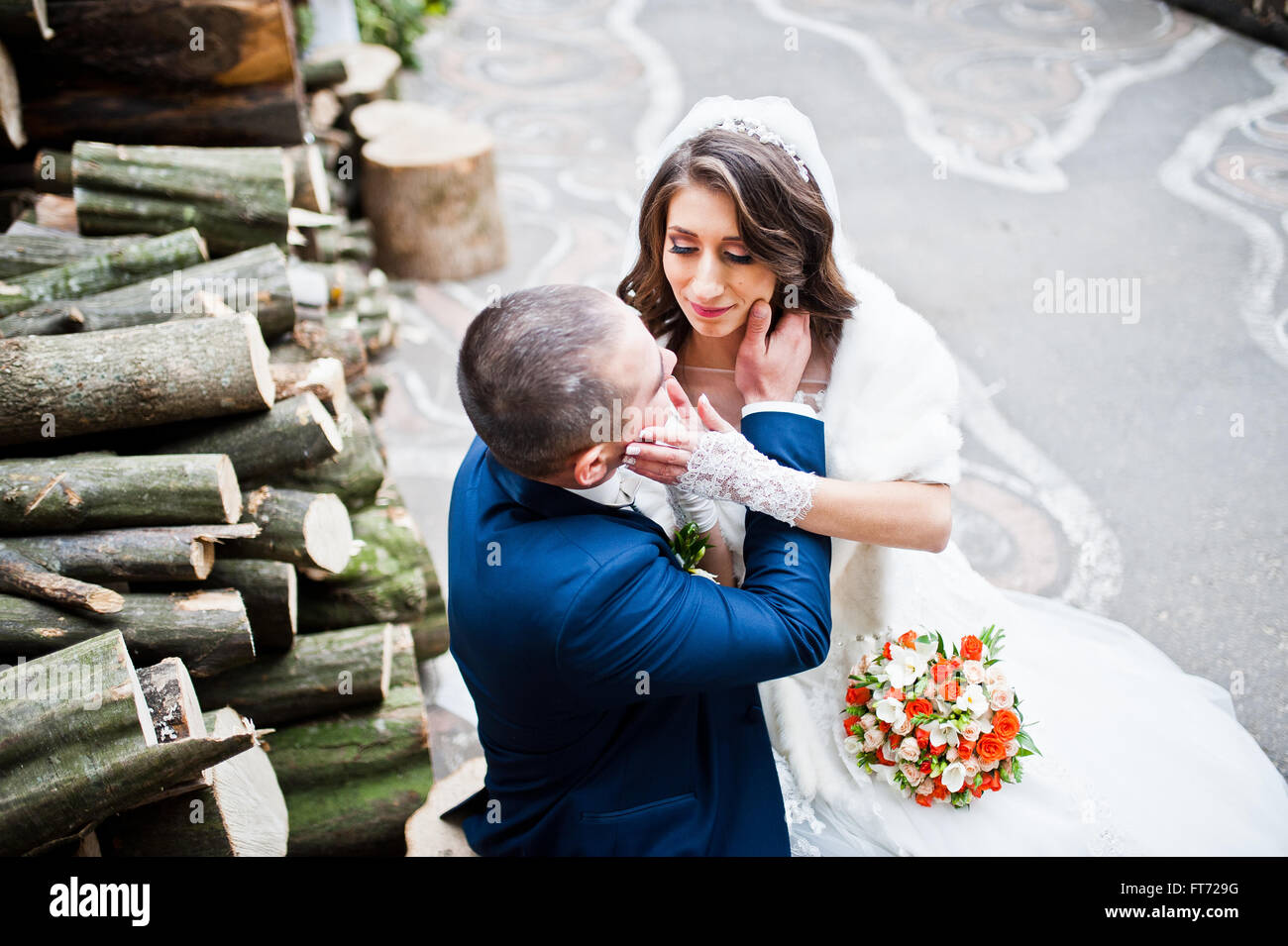 Wedding couple siitting background many stumps Stock Photo - Alamy