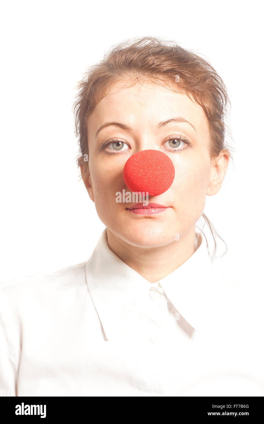 Woman with red clown nose isolated on white background Stock Photo - Alamy