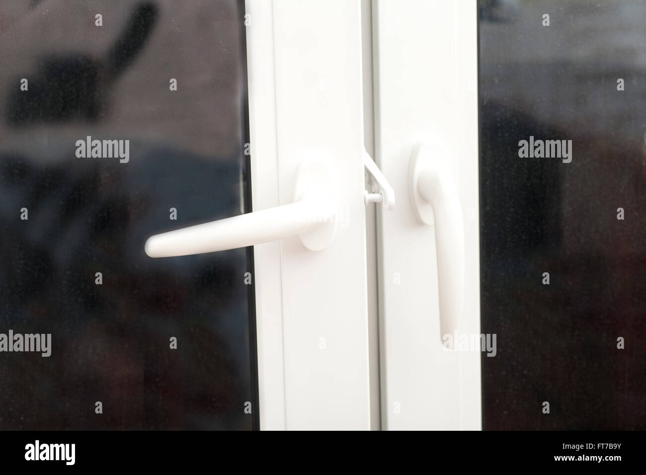 White Window handle on fiberglass window Stock Photo - Alamy