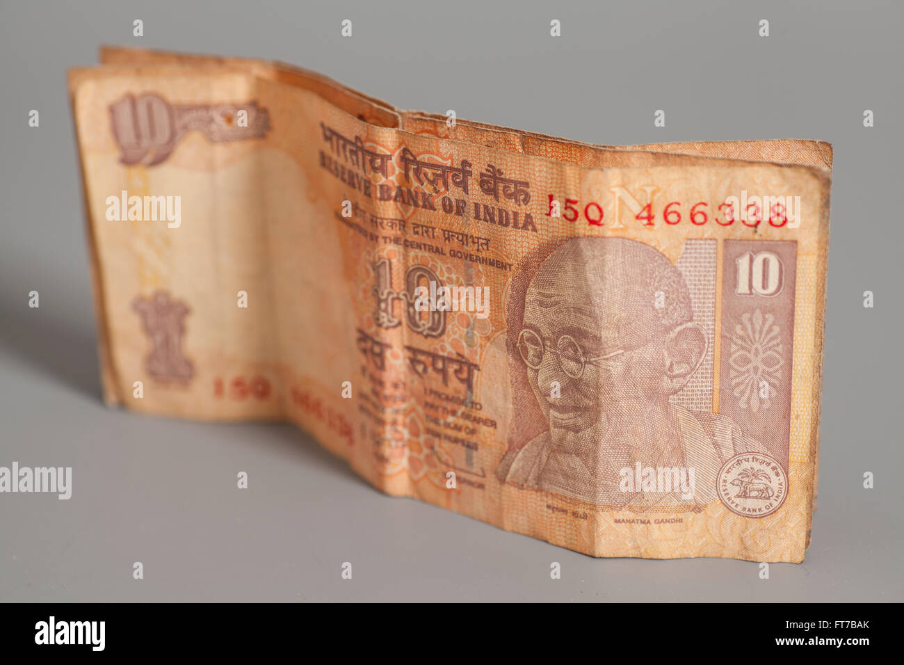 Ten Indian rupees isolated on gray background Stock Photo - Alamy