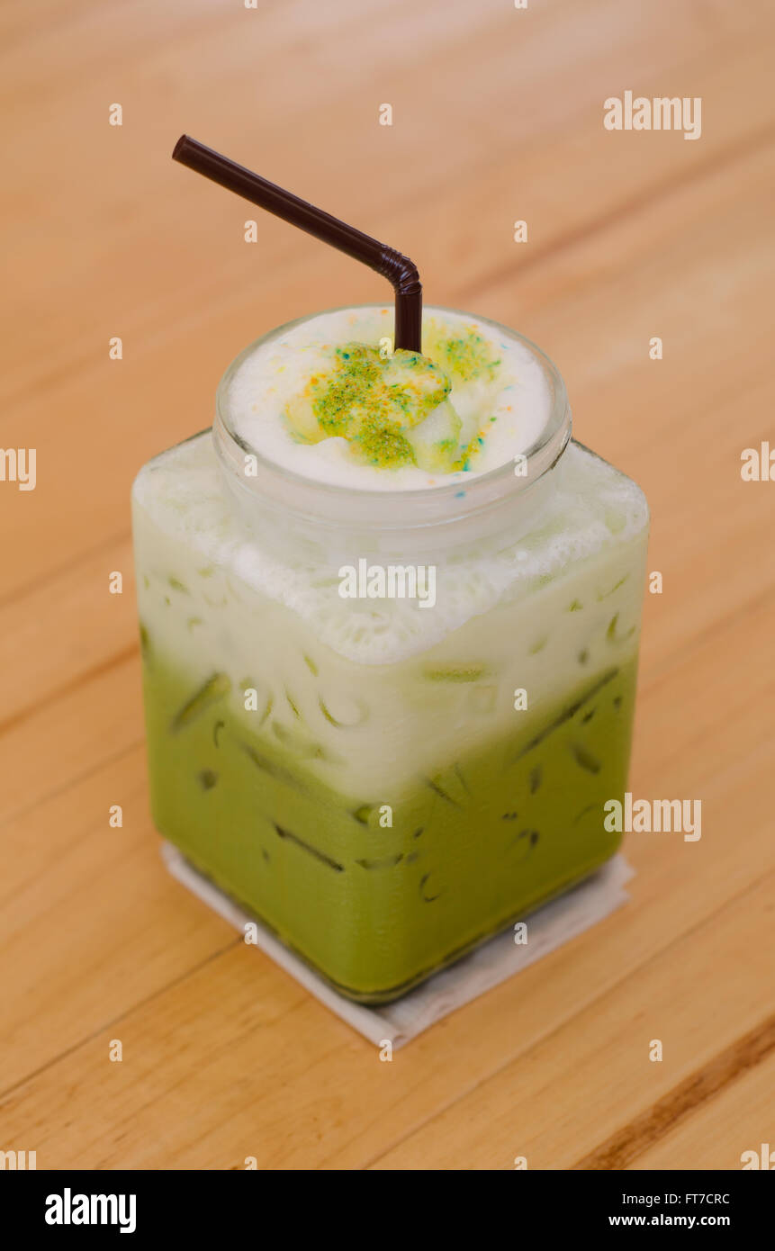 Ice green tea in glass bottle Stock Photo - Alamy