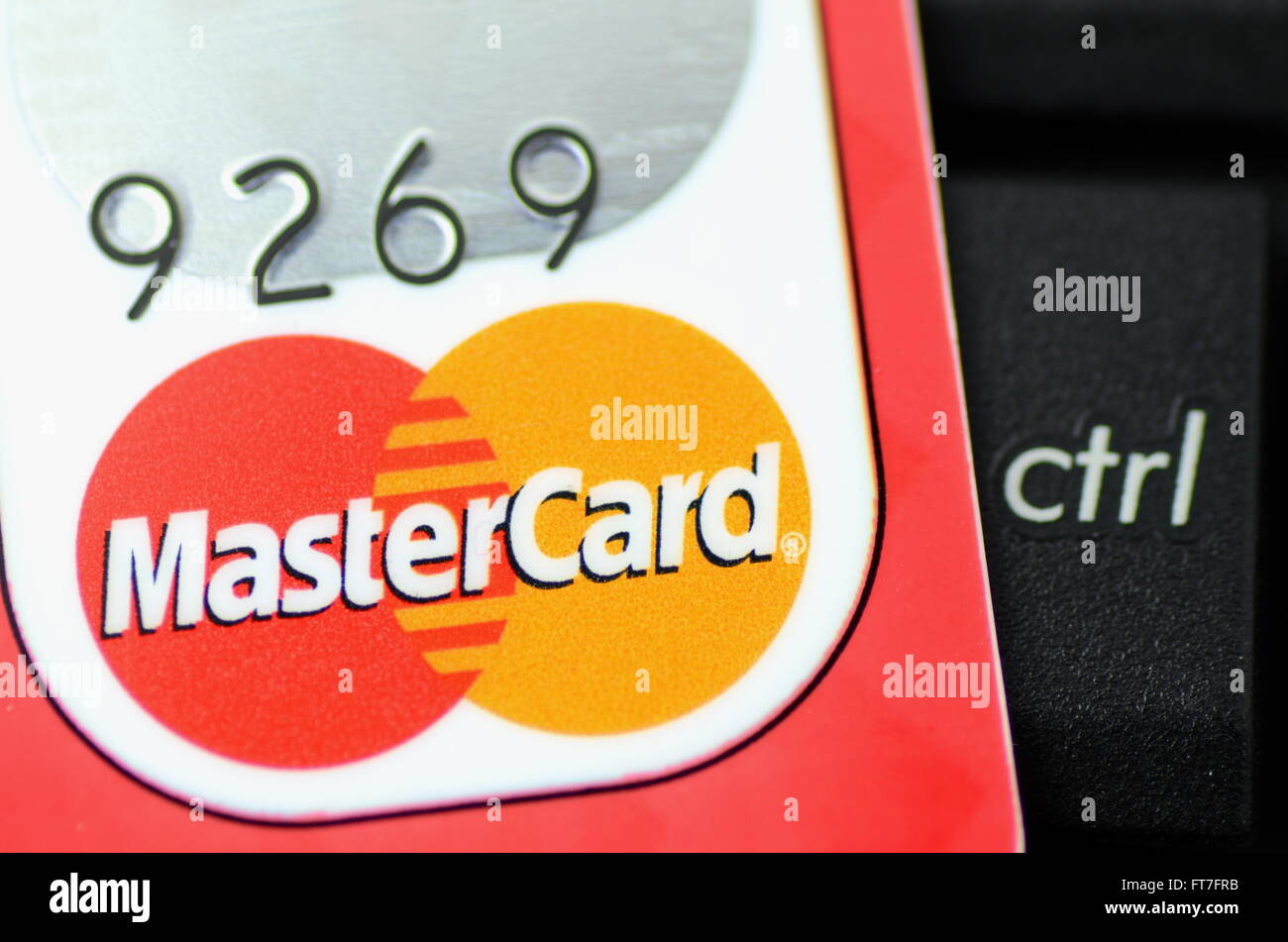 Closeup of MasterCard debit card on laptop keyboard Stock Photo - Alamy