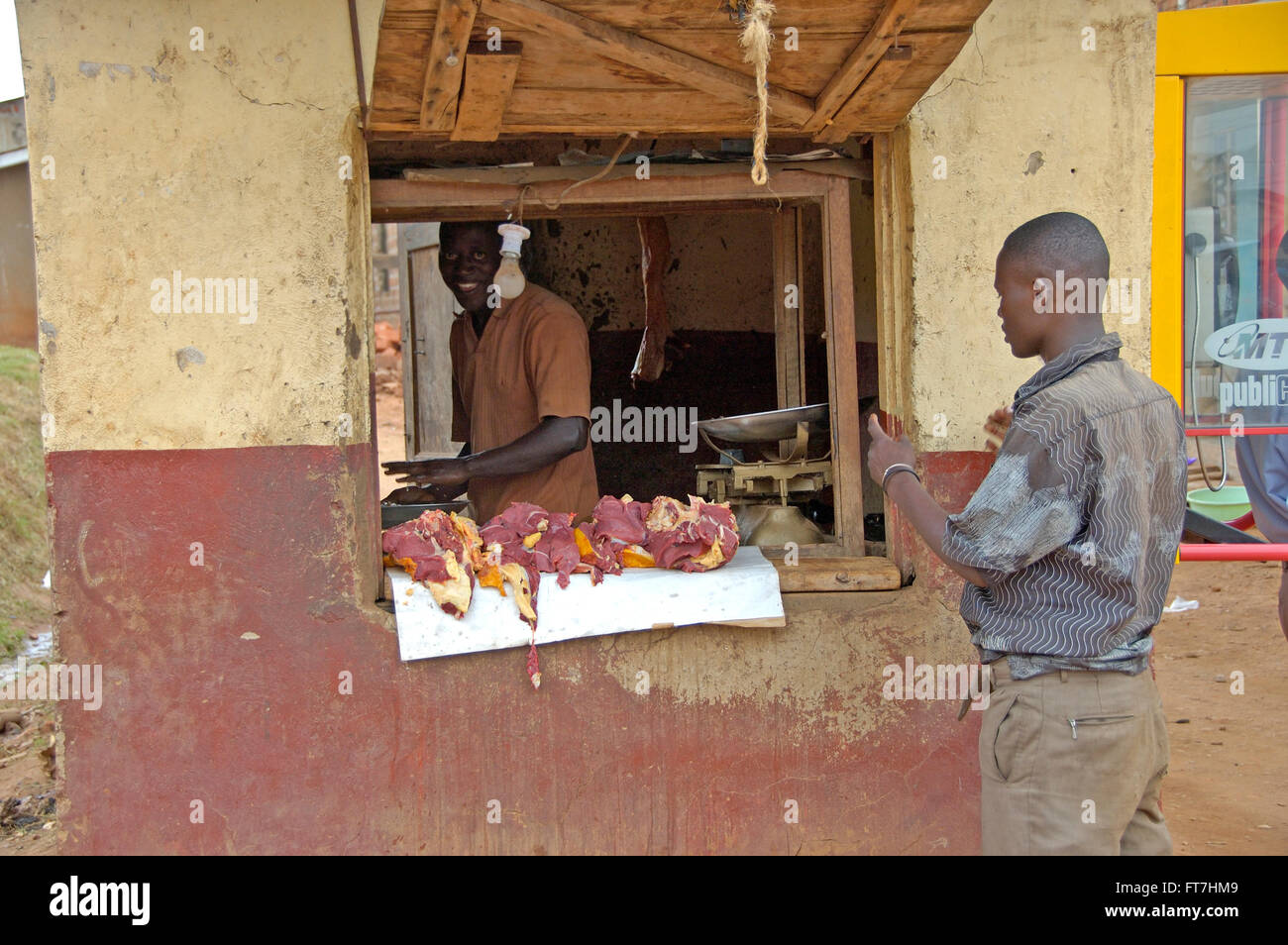 Kampala, Uganda-11 April 2017. The way people life in Uganda. Butcher ...