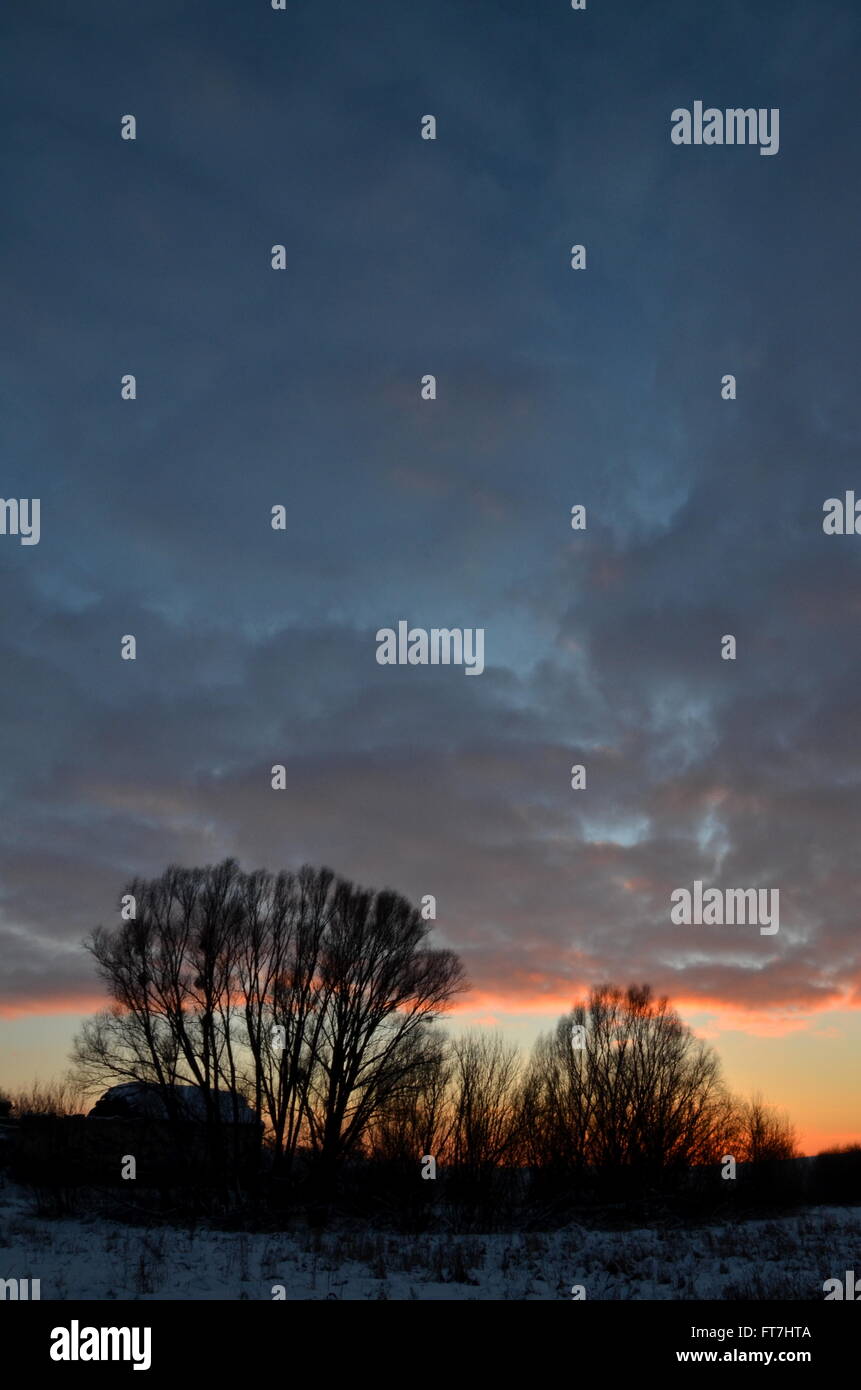 Picturesque dusk in the countryside in wintertime Stock Photo - Alamy