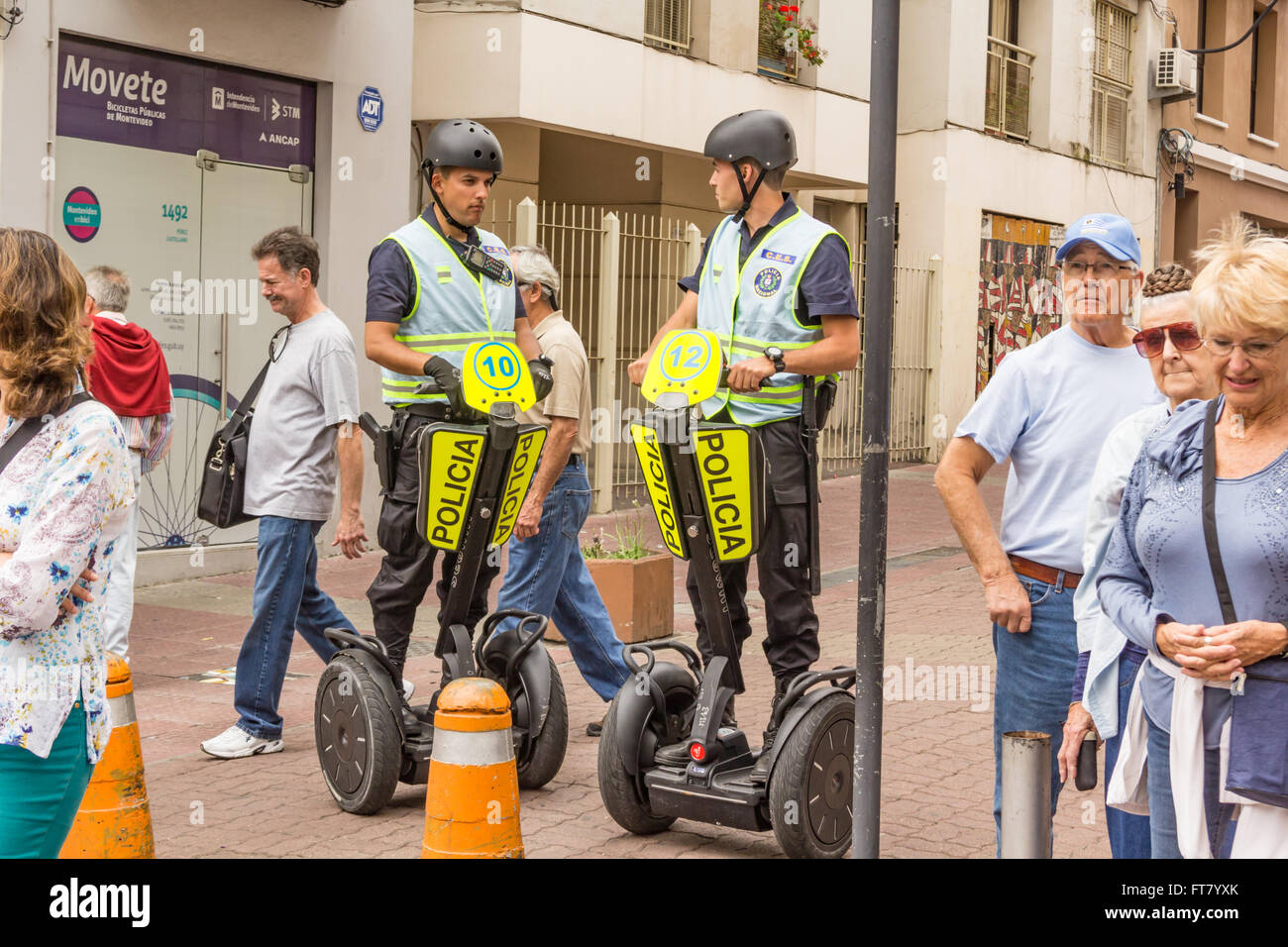 Two police women walking hi-res stock photography and images - Alamy
