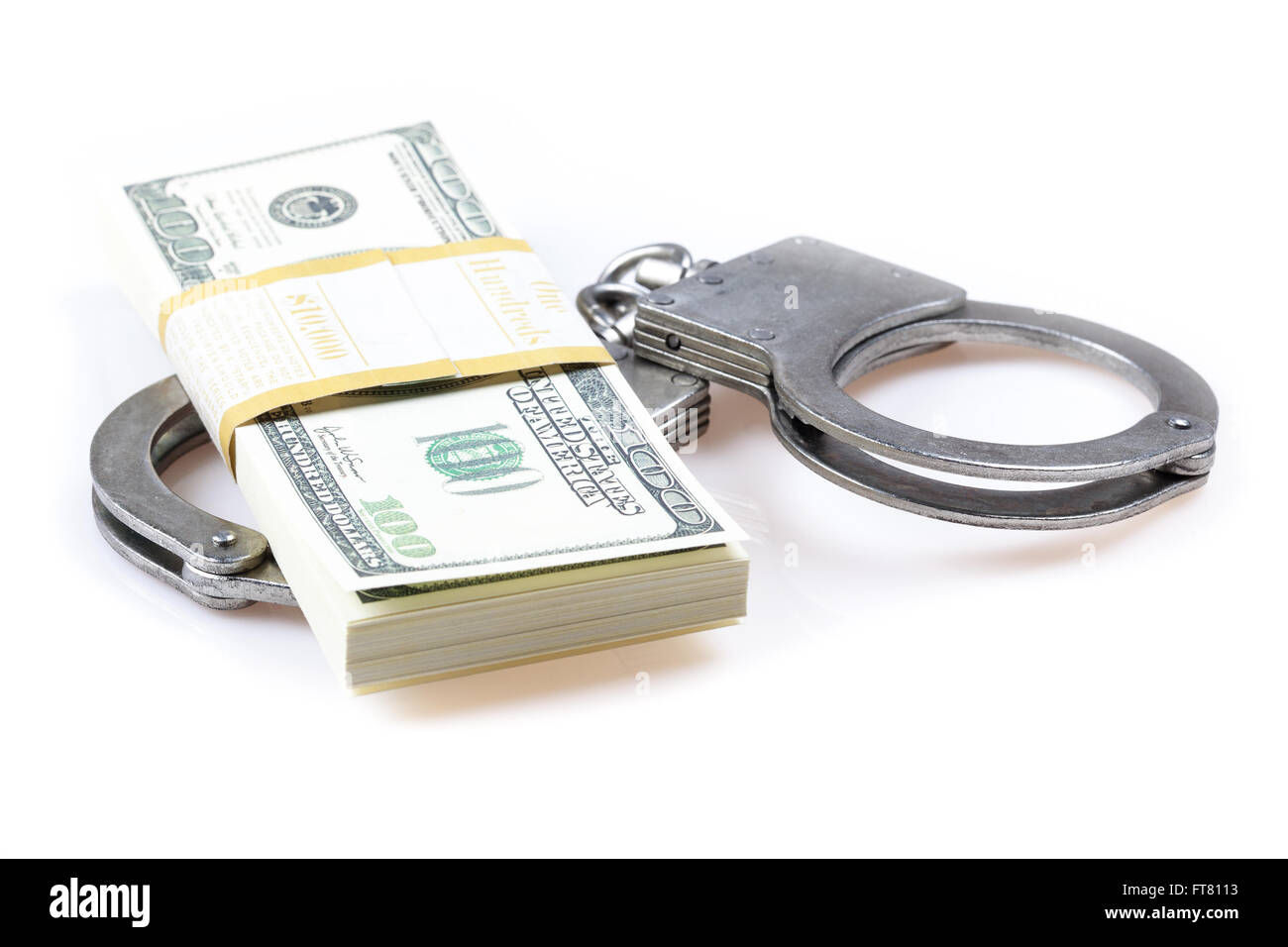 Crime dollar and handcuffs on white background Stock Photo - Alamy