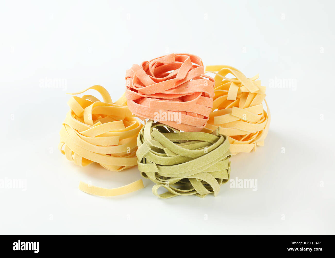 Bundles of dried ribbon pasta Stock Photo - Alamy