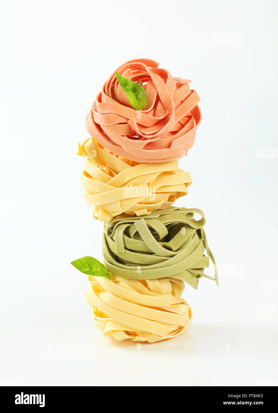 Bundles of dried ribbon pasta Stock Photo - Alamy