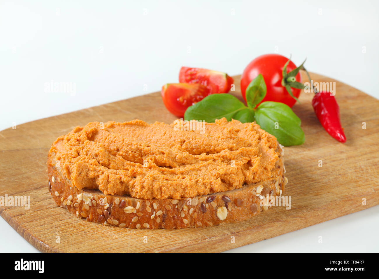 Whole grain bread with vegetarian spread Stock Photo - Alamy