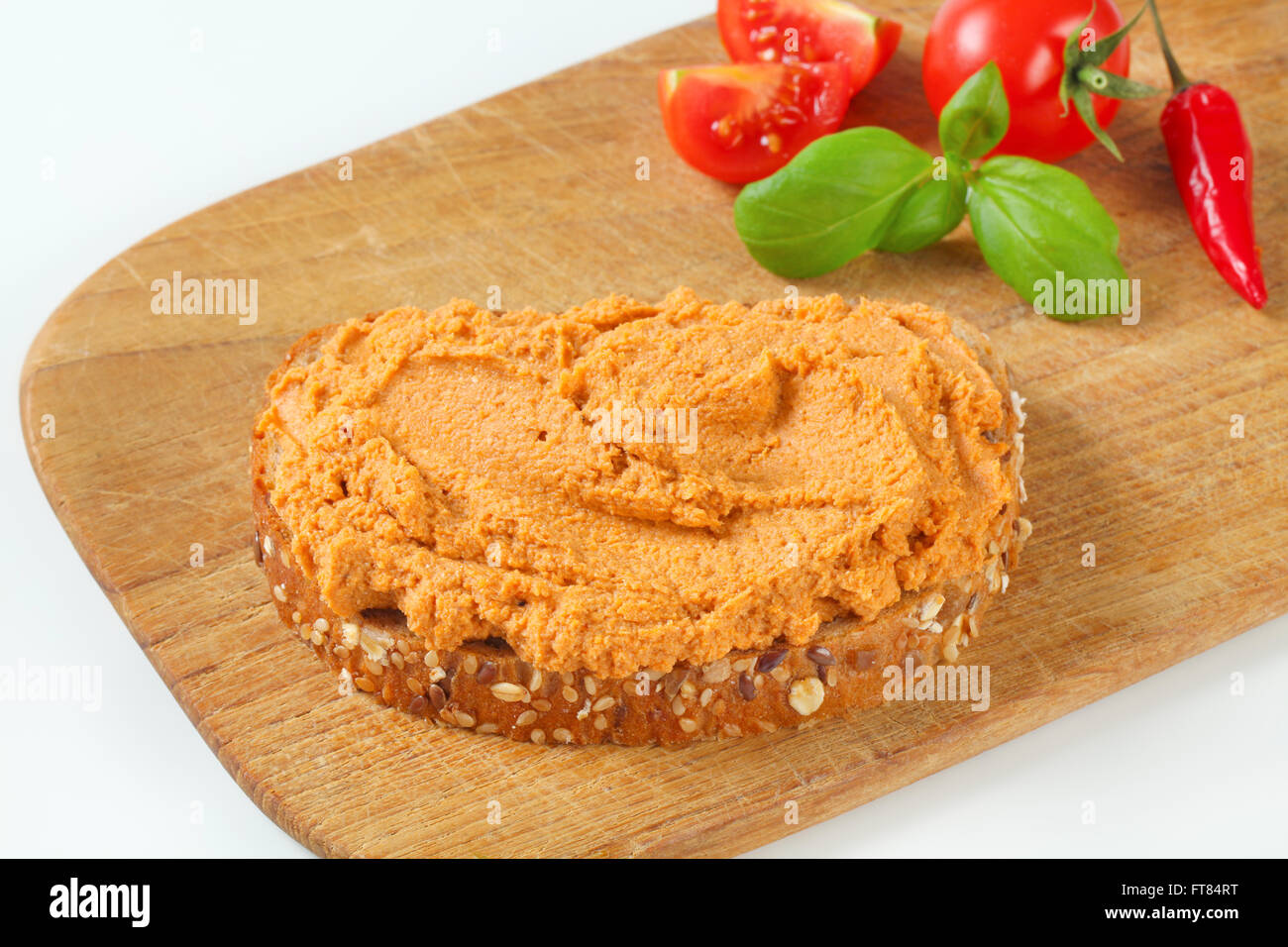 Whole grain bread with vegetarian spread Stock Photo - Alamy