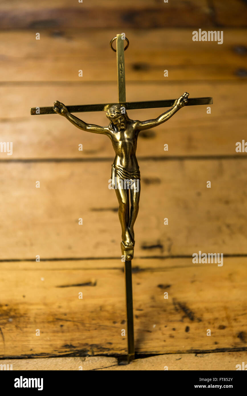 Jesus on metal cross Stock Photo - Alamy