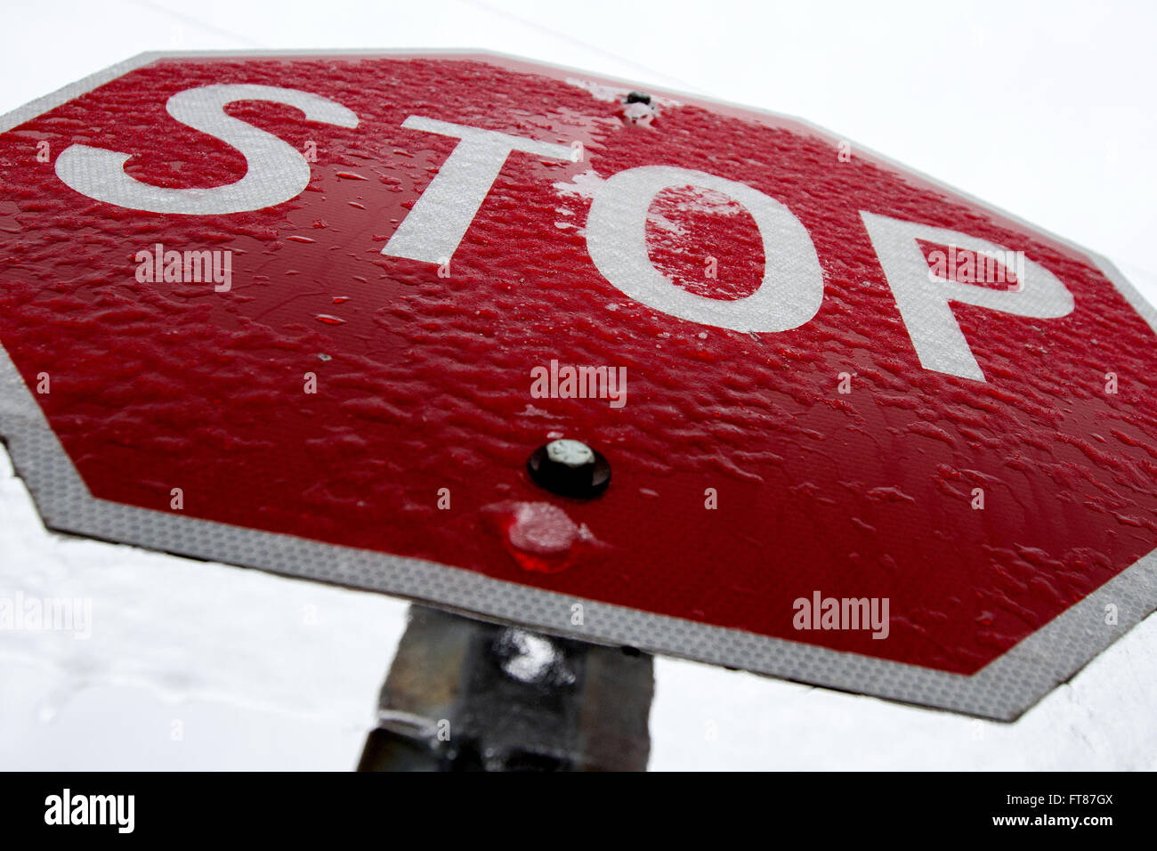 A stop sign with frozen rain on it, in Marlbank, Ont., on March 25 ...