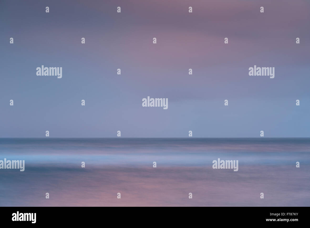 The subtle colours of the spring sunset are reflect in the atlantic ...