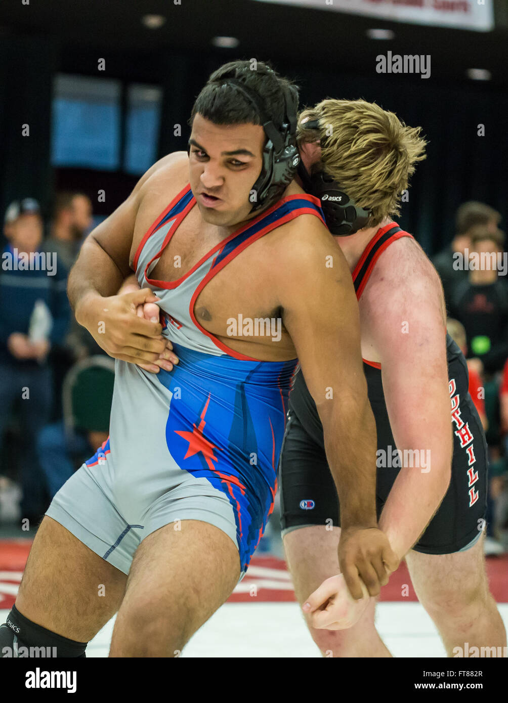 Redding, California: Two wrestlers on the mat against each other in the ...