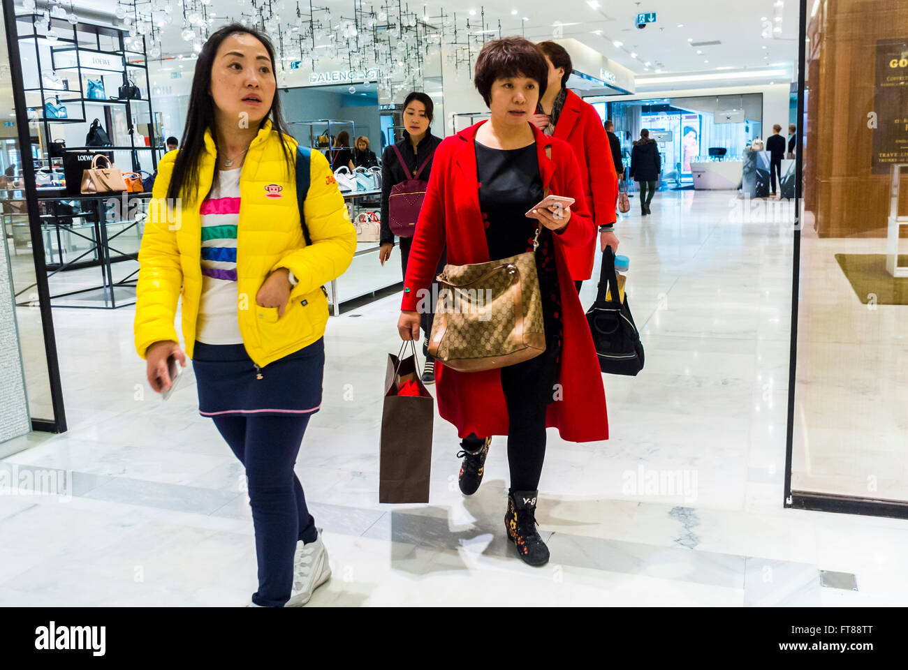 Interior lifestyle chinese tourists shopping inside luxury stores ...