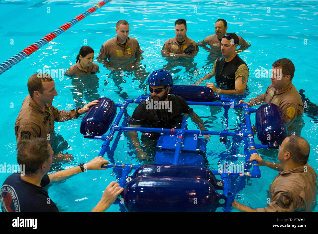 Pilots from the CBP Office of Air and Marine undergo inversion water ...