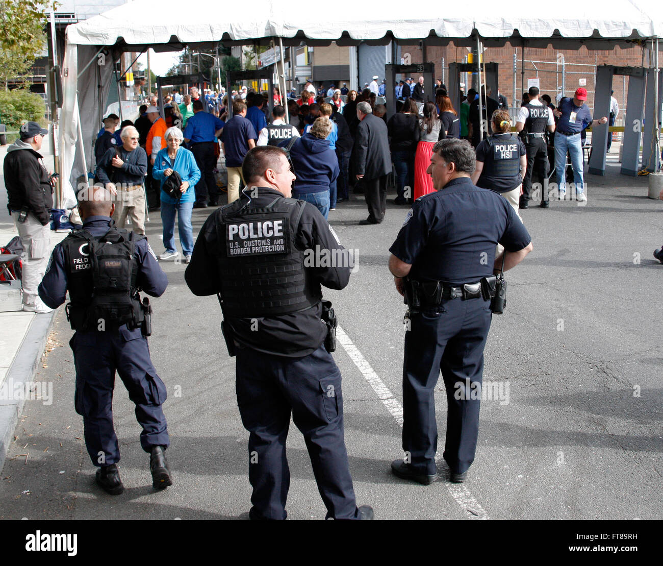 This photograph shows U.S. Customs and Border Protection (CBP) officers ...