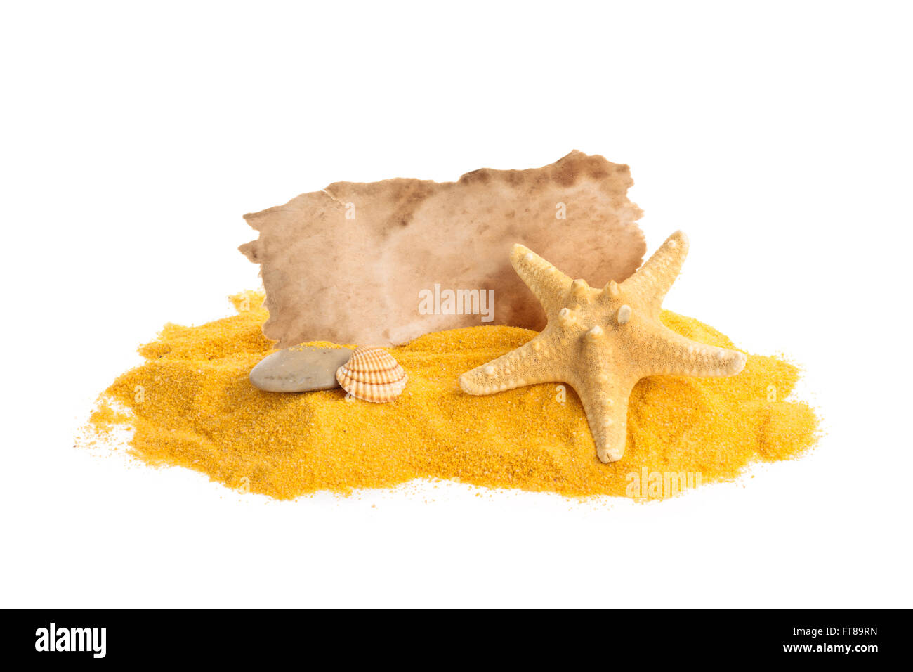 Shells, pebbles and old paper on yellow sand Stock Photo - Alamy