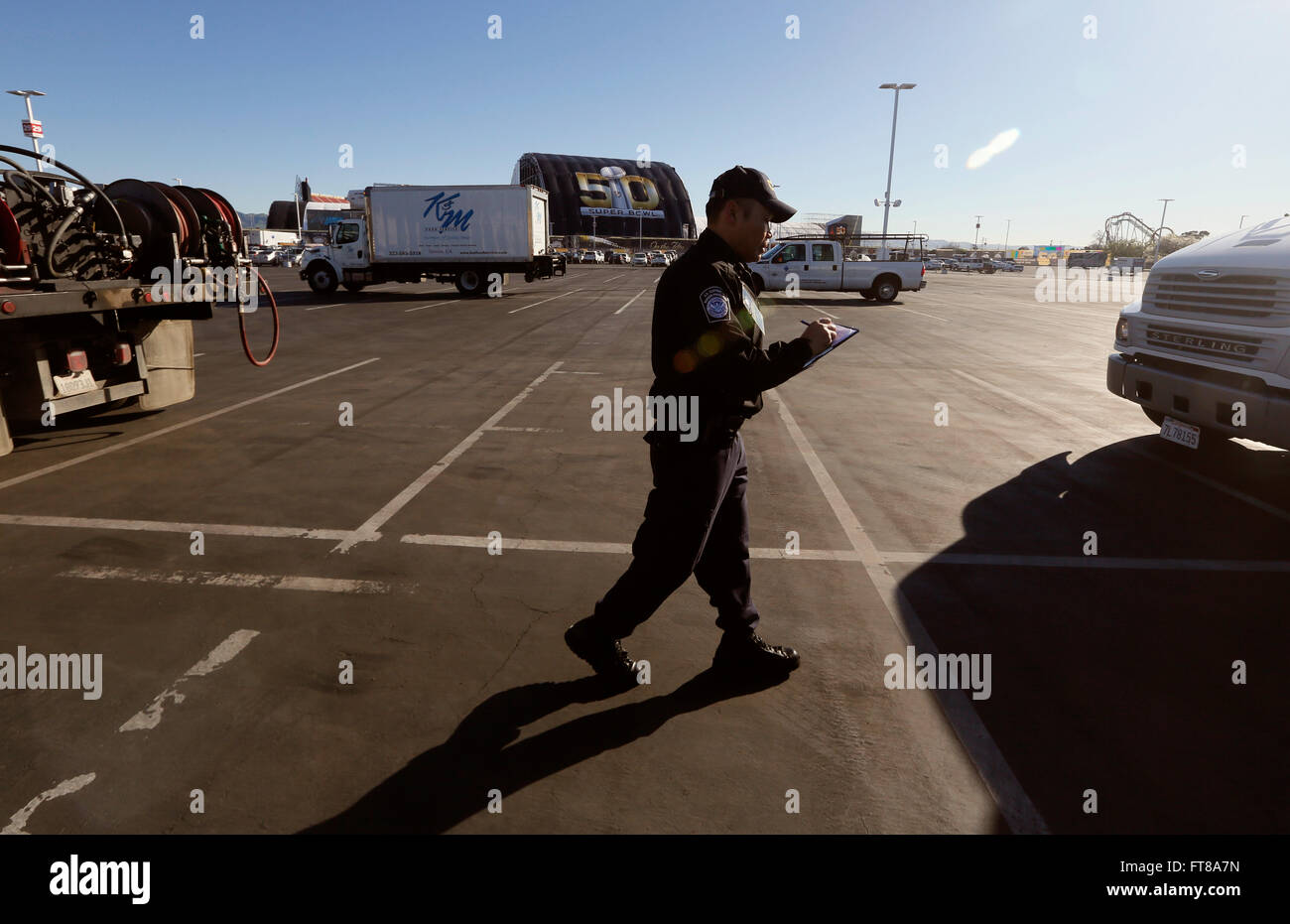 A U.S. Customs and Border Protection officer oversees non-intrusive ...