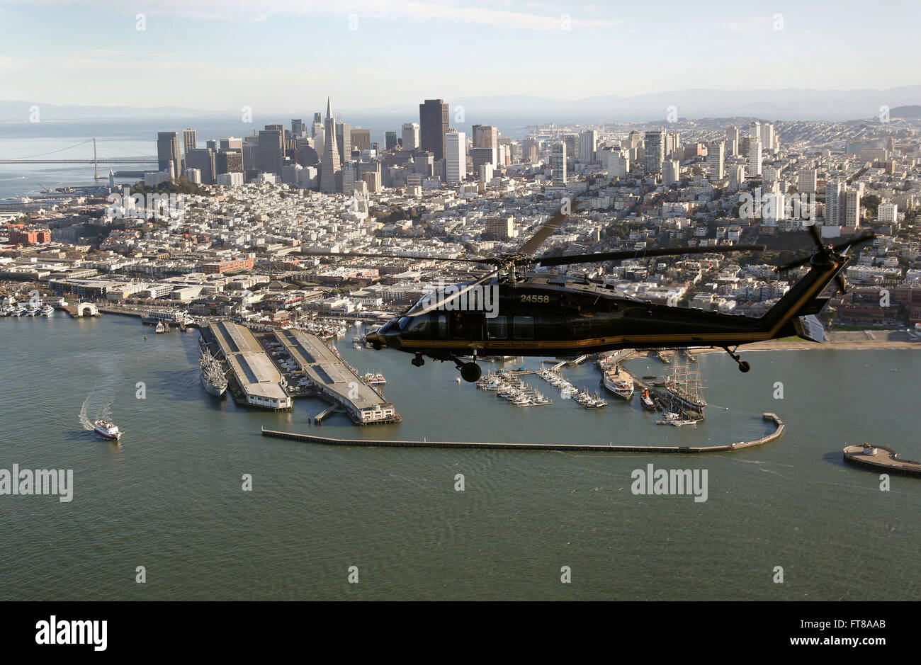 A U.S. Customs and Border Protection Black Hawk helicopter flies over ...