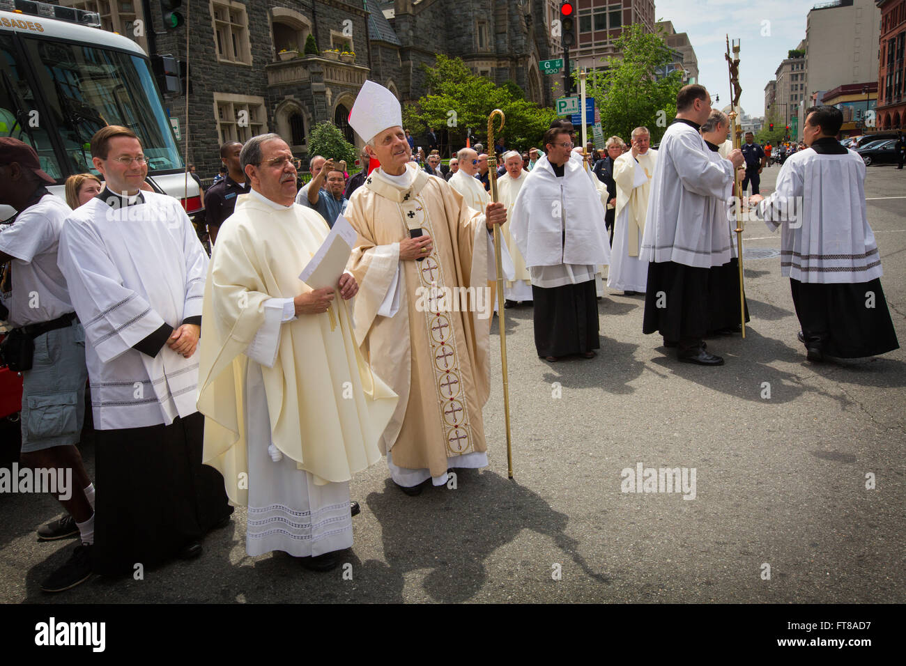 Cardinal Wuerl observes as the color guards pass from many law ...