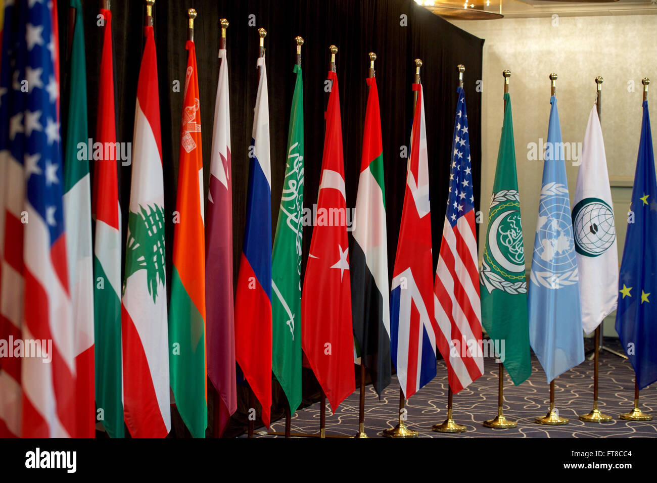 Flags stand displayed at the Hilton Hotel in Munich, Germany, on ...