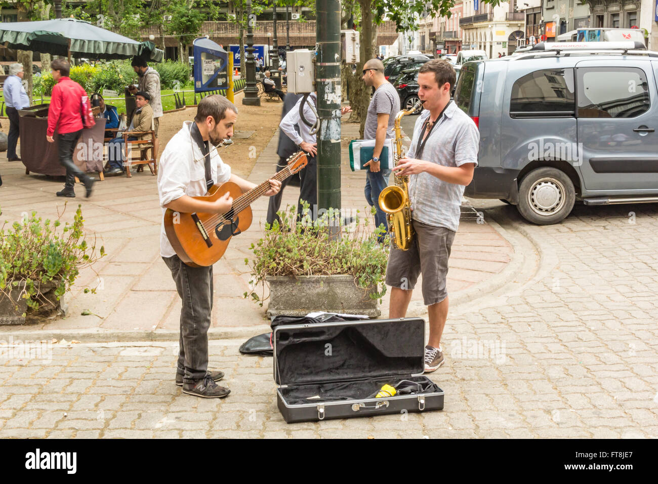 STREET MUSICIANS, MONTIVIDEO, URUGUAY - CIRCA DECEMBER 2015. Two men ...